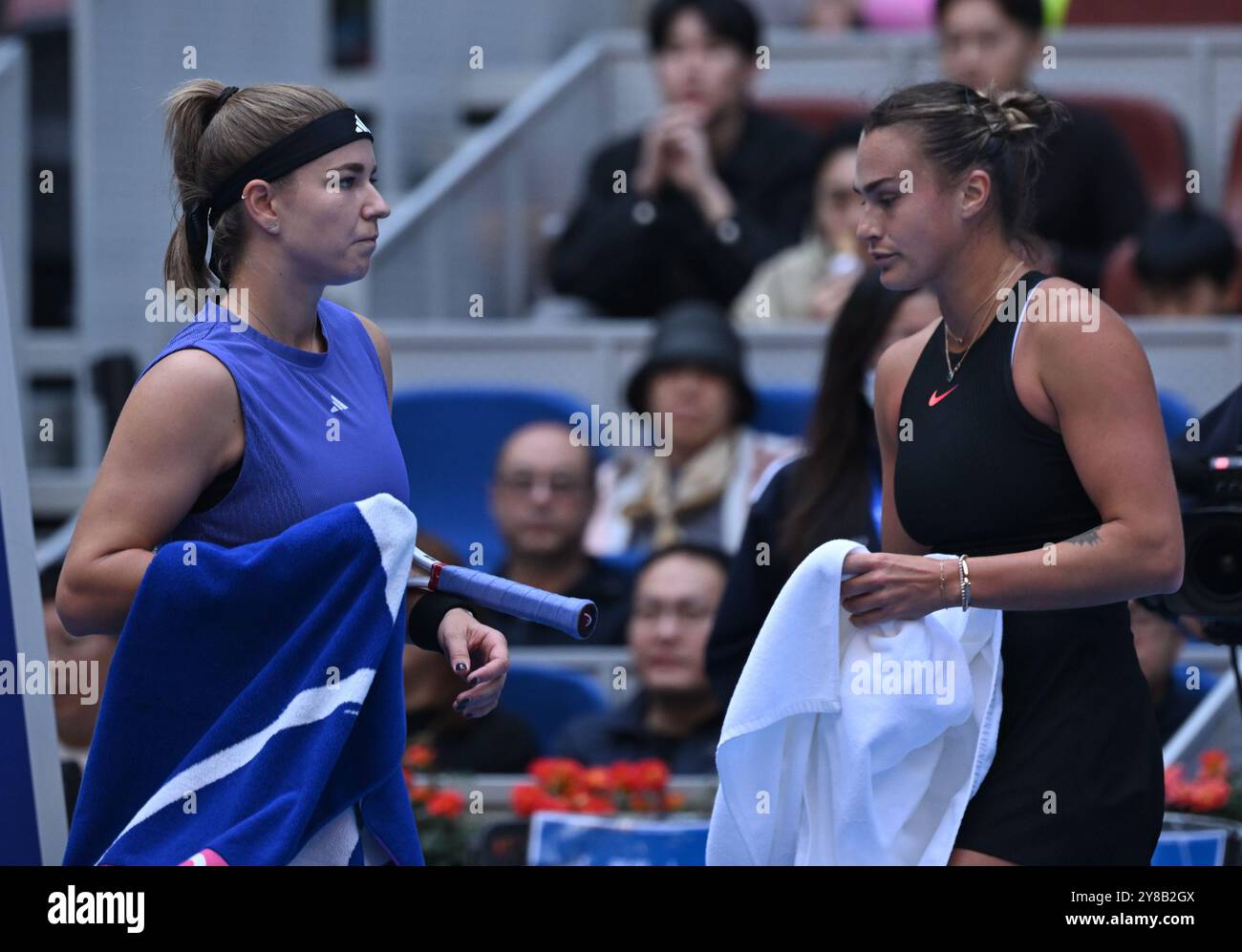 Beijing, China. 4th Oct, 2024. Karolina Muchova (L) and Aryna Sabalenka ...