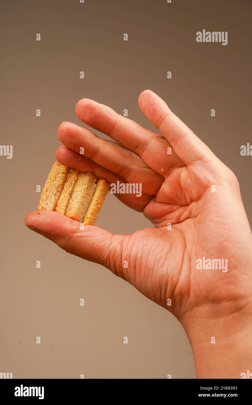 Snack. Cholesterol. Fast carbohydrates. Salty snack for beer. Unhealthy ...