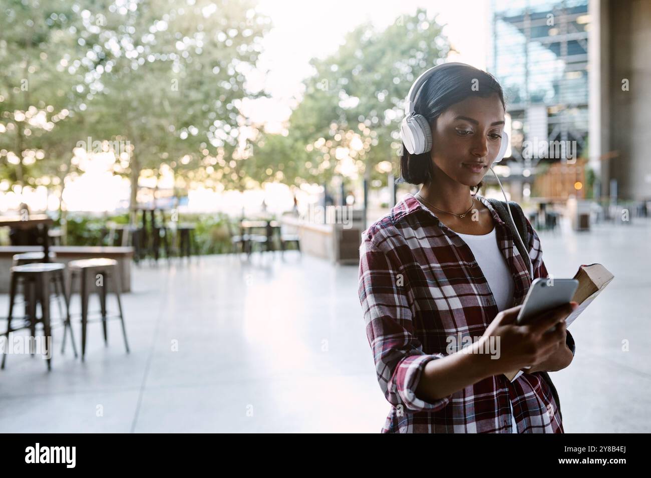 Girl walking reading educational hi-res stock photography and images ...