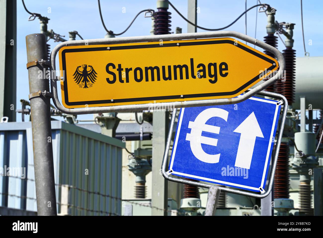 PHOTO MONTAGE, signpost with inscription electricity levy and sign with ...