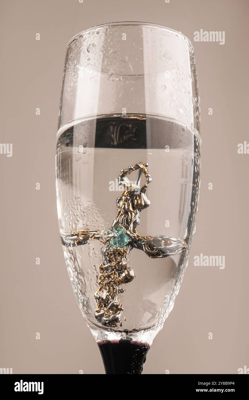 Viking Age pendant. A jewelry cross in a glass for alcohol. Silver ...