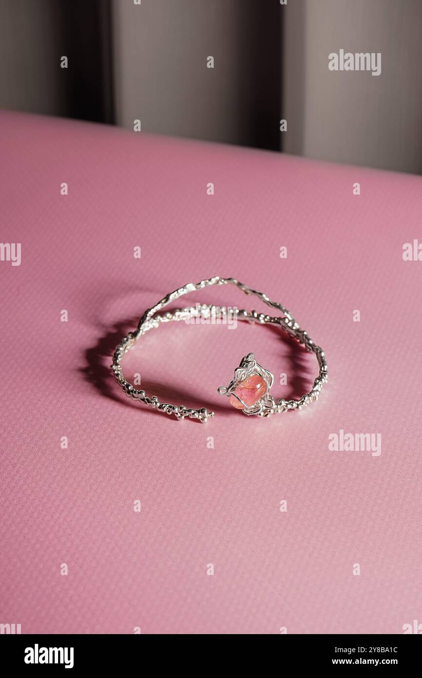 Side view of gem ring detail. A ring in a modern avant-garde style ...