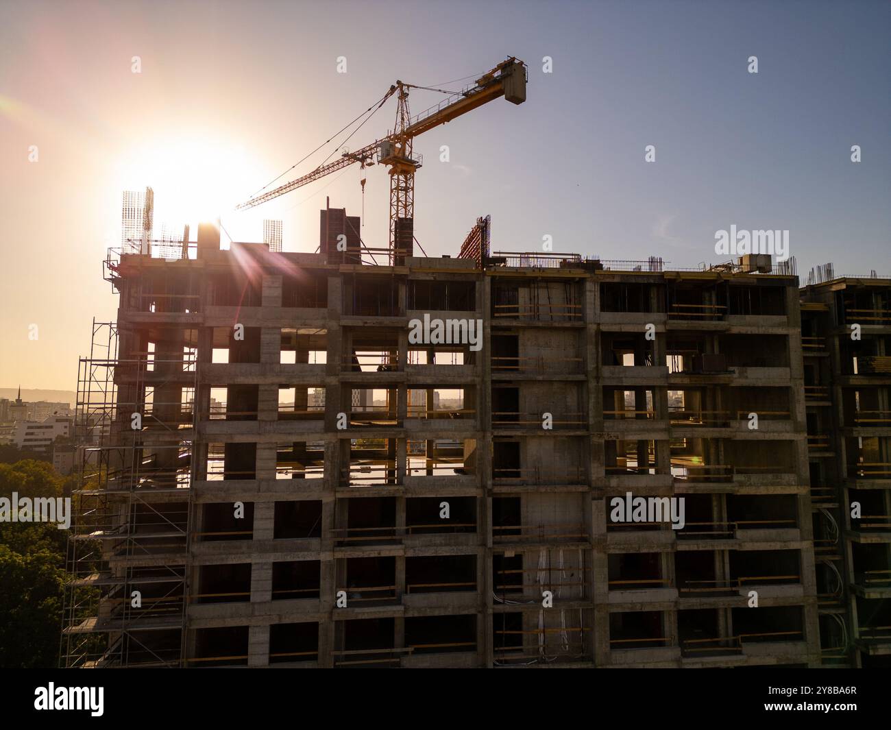 A drone video capturing the construction site of a high-rise building ...
