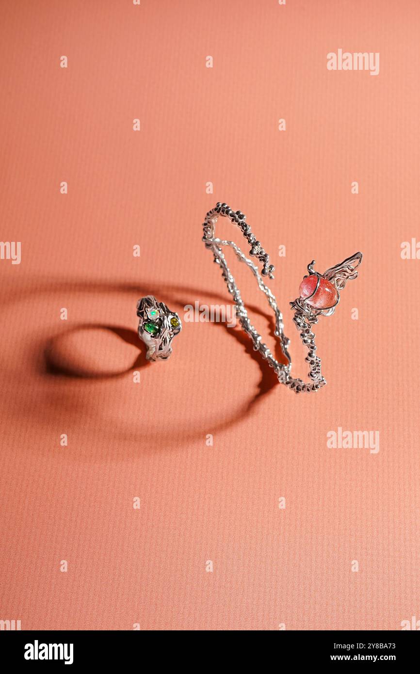 Side view of gem ring detail. A ring in a modern avant-garde style ...