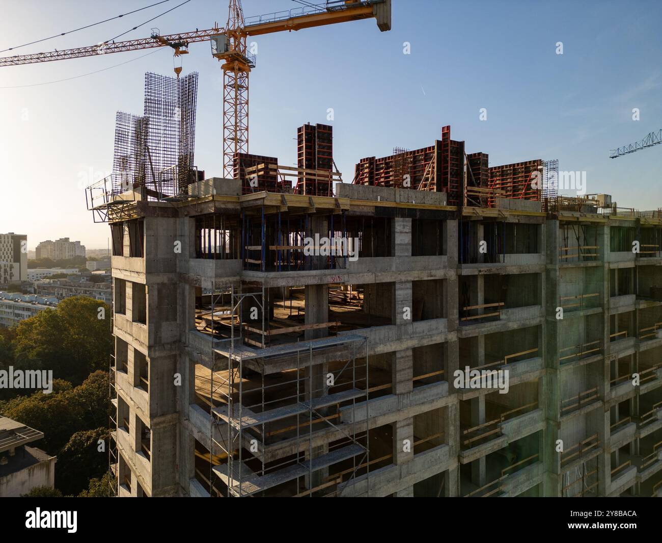 Aerial video construction crane sunset hi-res stock photography and ...