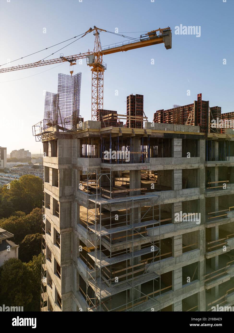 A drone video capturing the construction site of a high-rise building ...