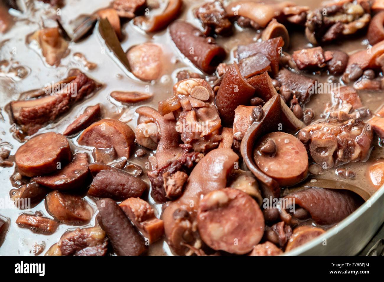 Classic Brazilian feijoada with traditional ingredients Stock Photo - Alamy