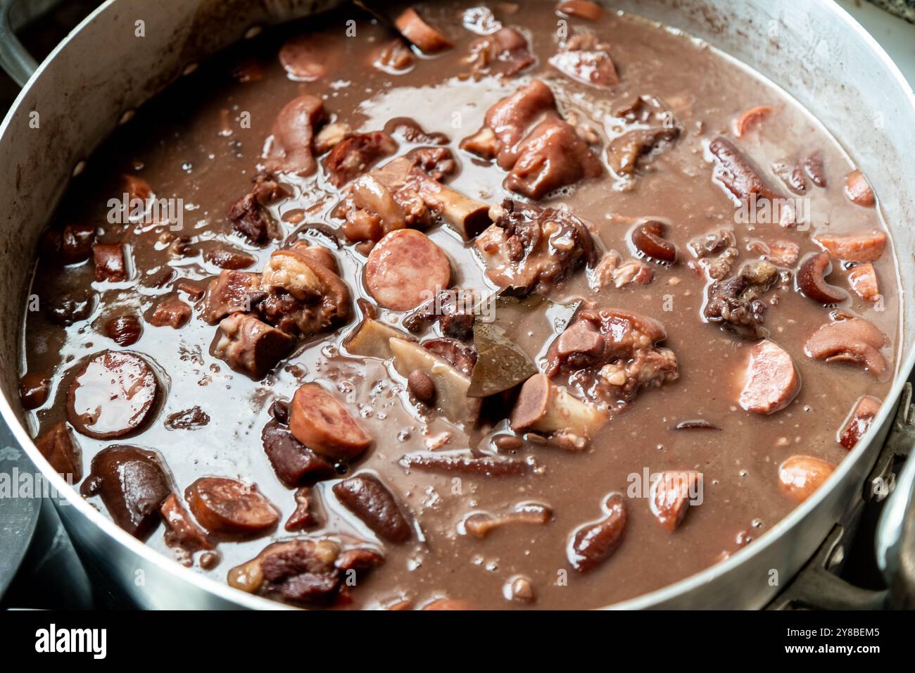 Classic Brazilian feijoada with traditional ingredients Stock Photo - Alamy