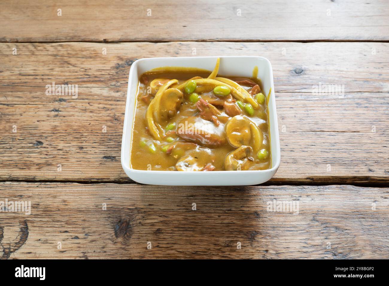 Mock char sui in curry sauce vegetarian friendly Asian meal Stock Photo ...