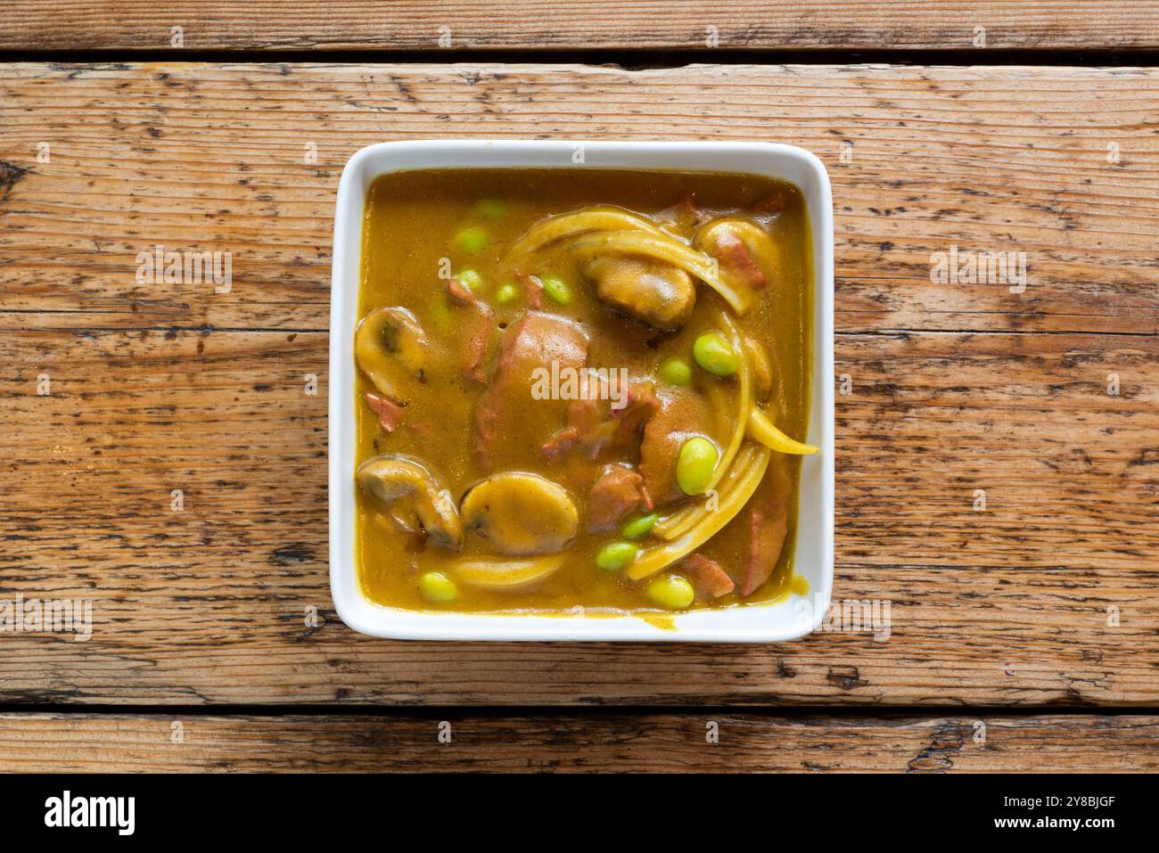 Mock char sui in curry sauce vegetarian friendly Asian meal Stock Photo ...