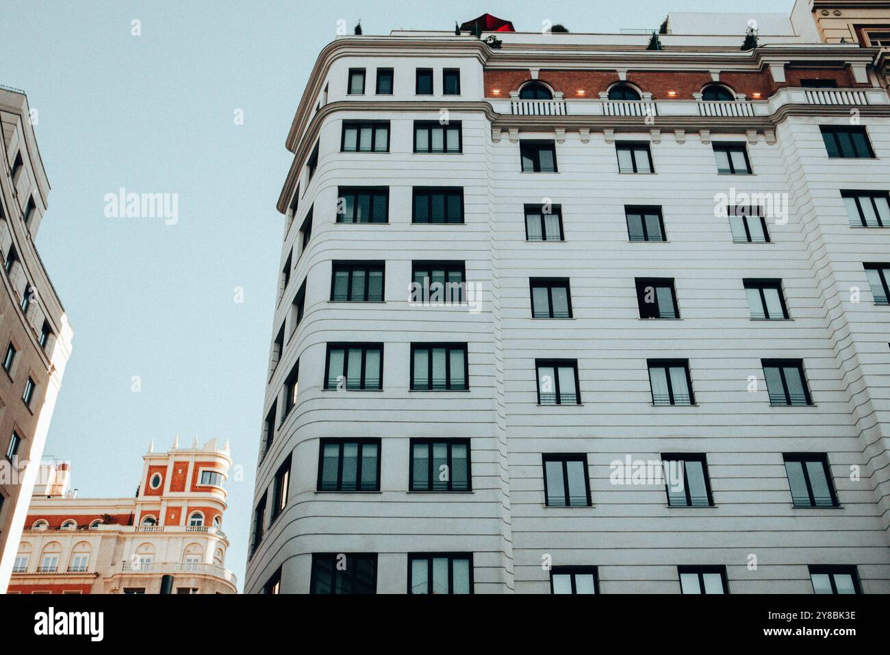 Madrid, Spain. 1 May 2024 Modern tall white apartment building exterior ...