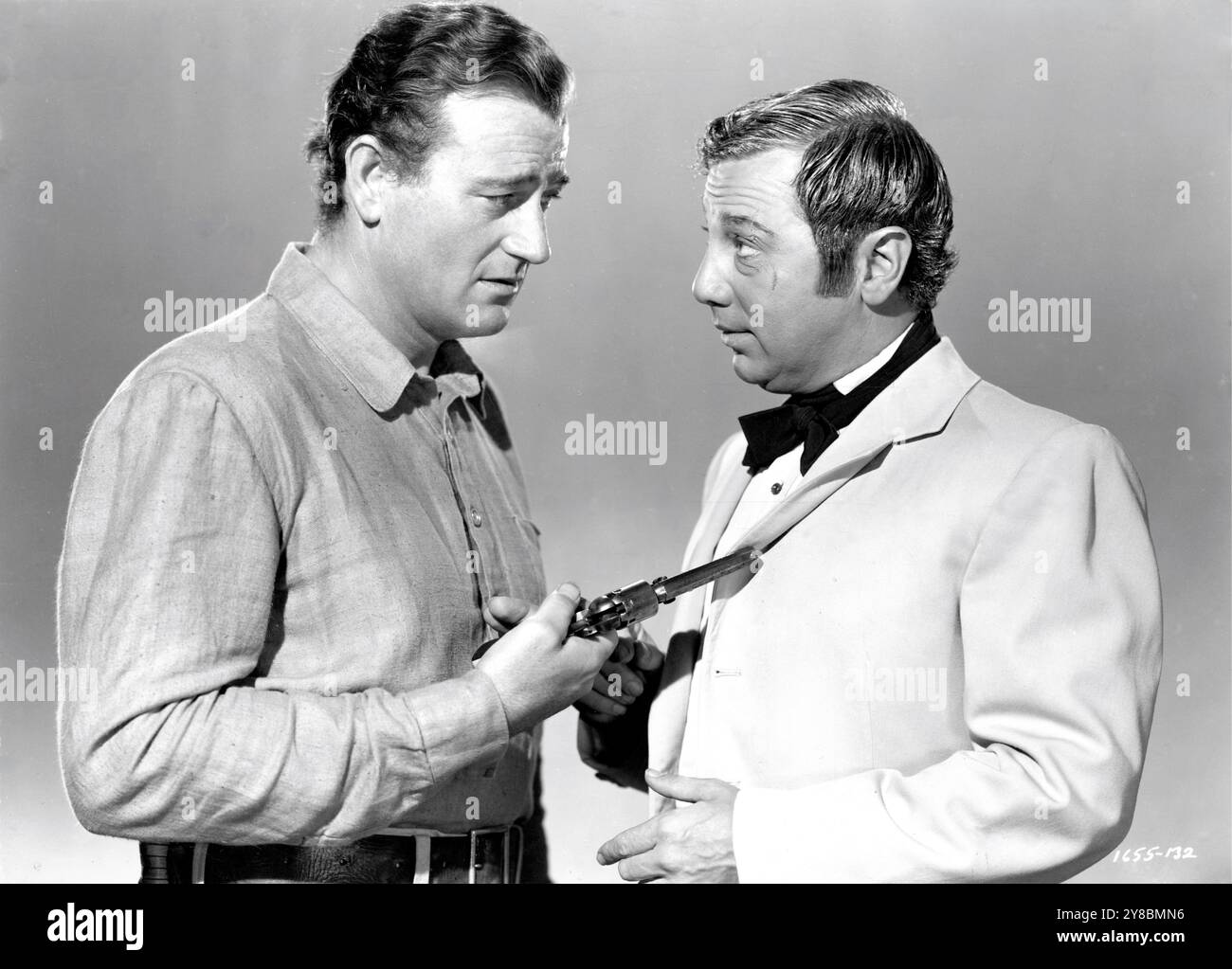 JOHN WAYNE and LUTHER ADLER in WAKE OF THE RED WITCH 1948 director ...