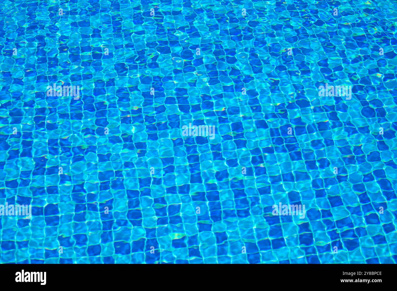 Underwater view of sunlight reflecting on the swimming pool floor ...