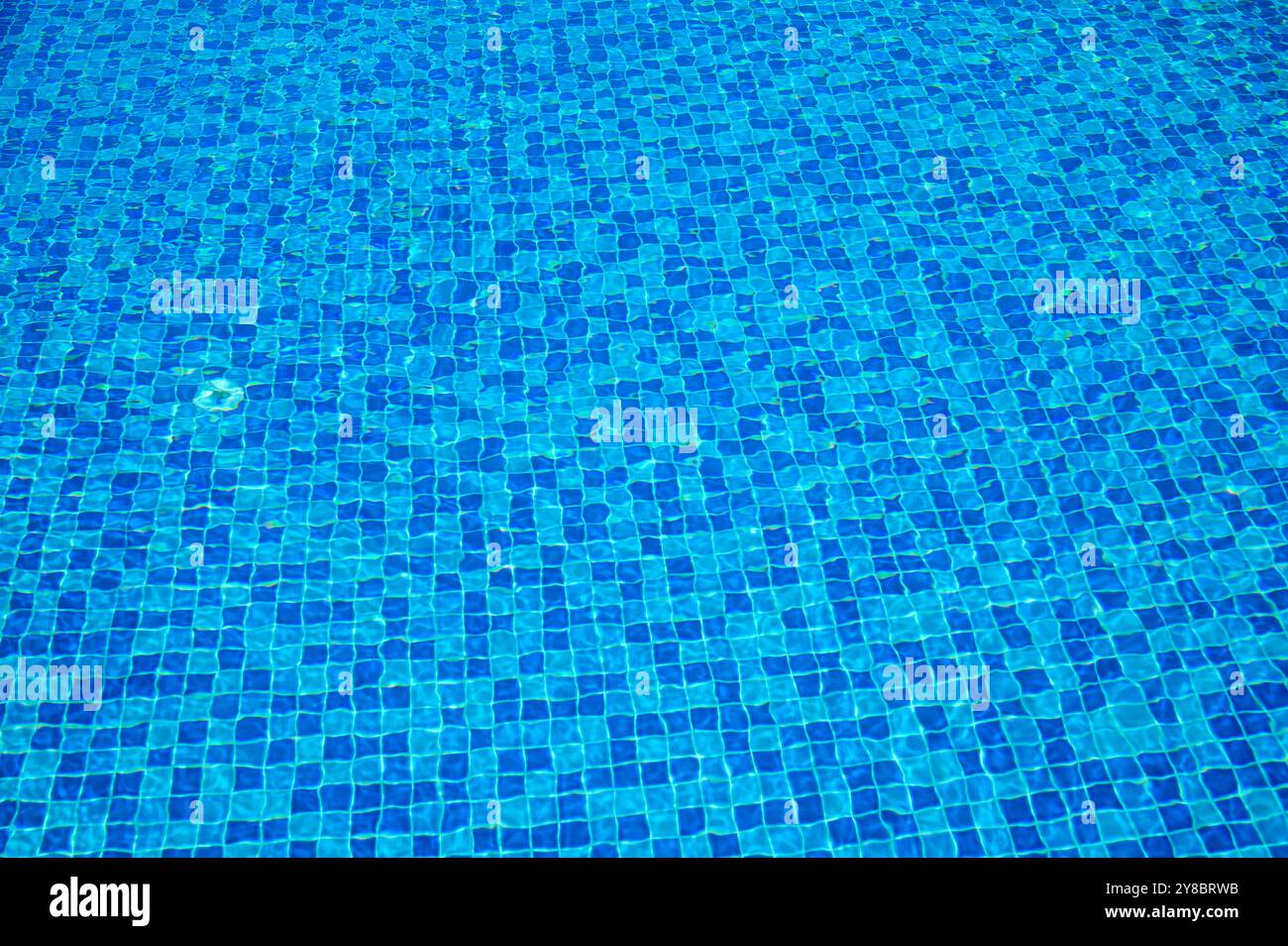 Pure blue water in the pool with light reflection Stock Photo - Alamy