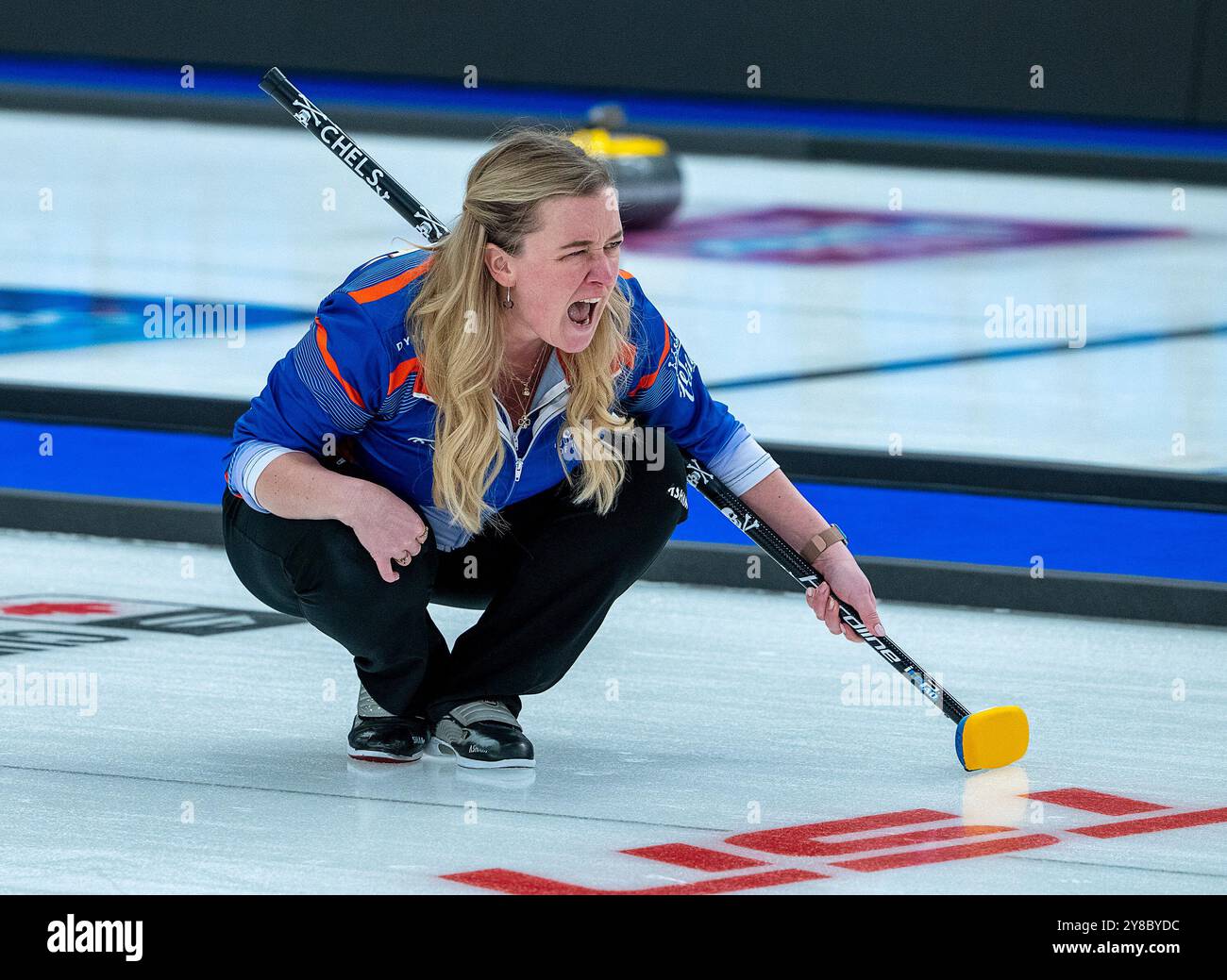 Wild Card 2 skip Chelsea Carey directs her sweepers as they play Wild ...