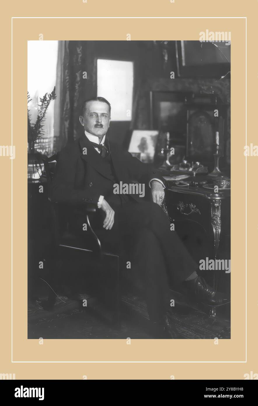 Count Brockdorff-Rantzau, full-length portrait, seated at desk, facing ...