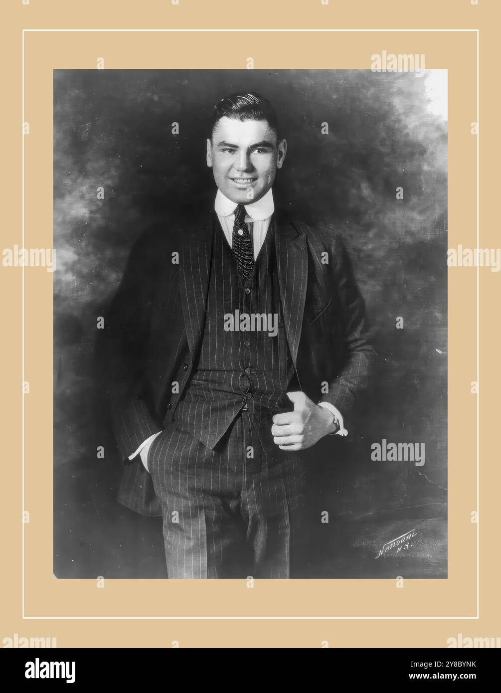 Jack Dempsey, 1895-, three-quarter length portrait, standing, facing ...
