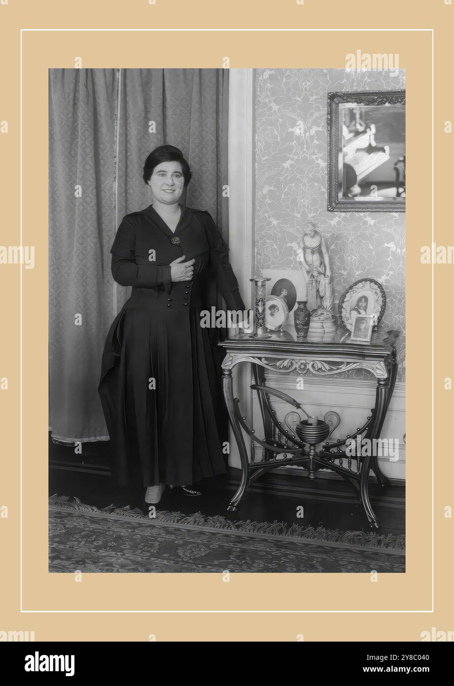 Amy Castles, full length portrait, standing, facing right. Australian ...