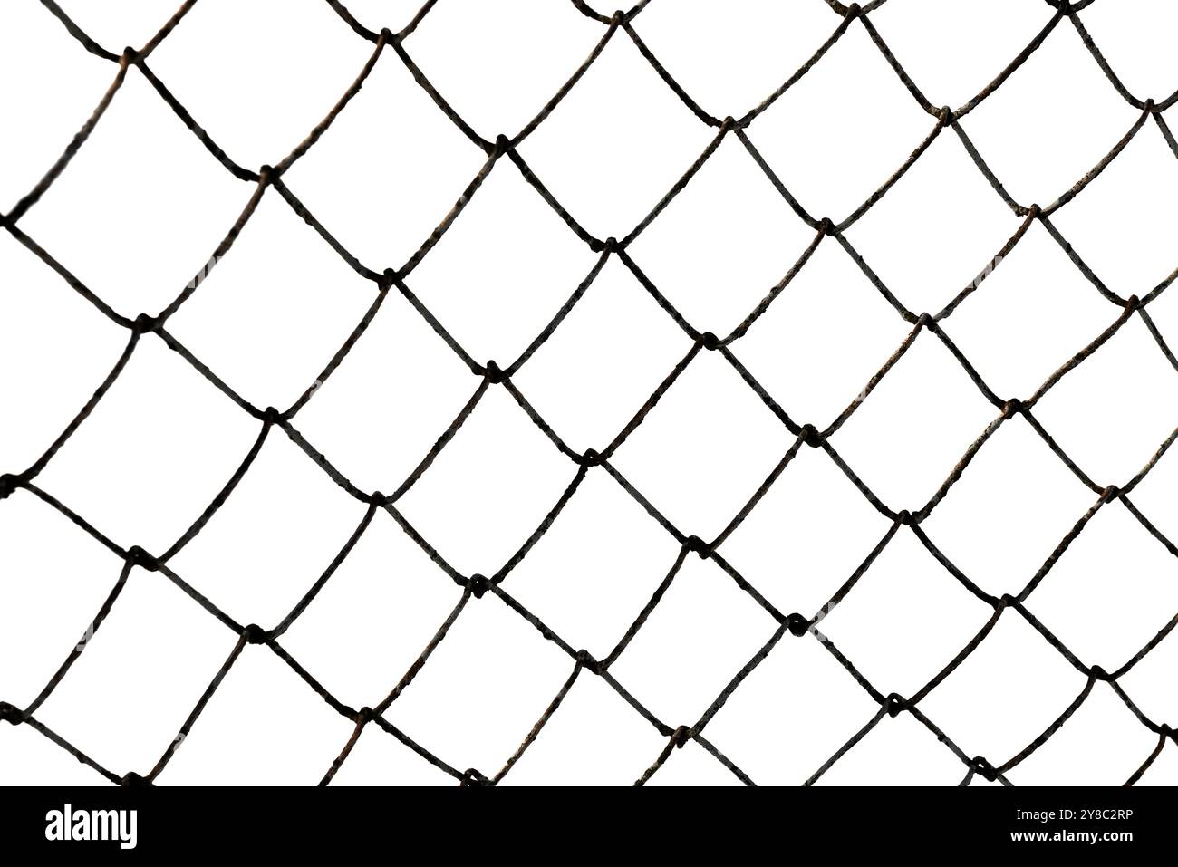 The texture of the metal mesh. Torn, destroyed, broken metal mesh on a ...