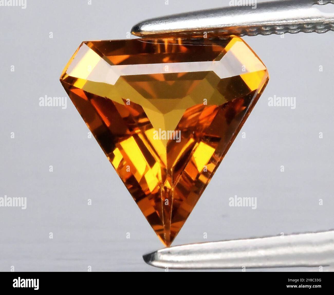Stunning Amber Diamond Cut Gemstone Displayed with Precision and ...