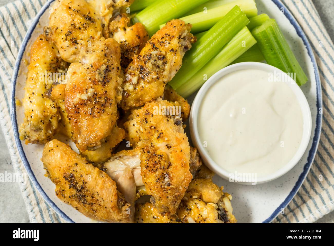 Spicy Homemade Lemon Pepper Chicken Wings with Blue Cheese Stock Photo ...