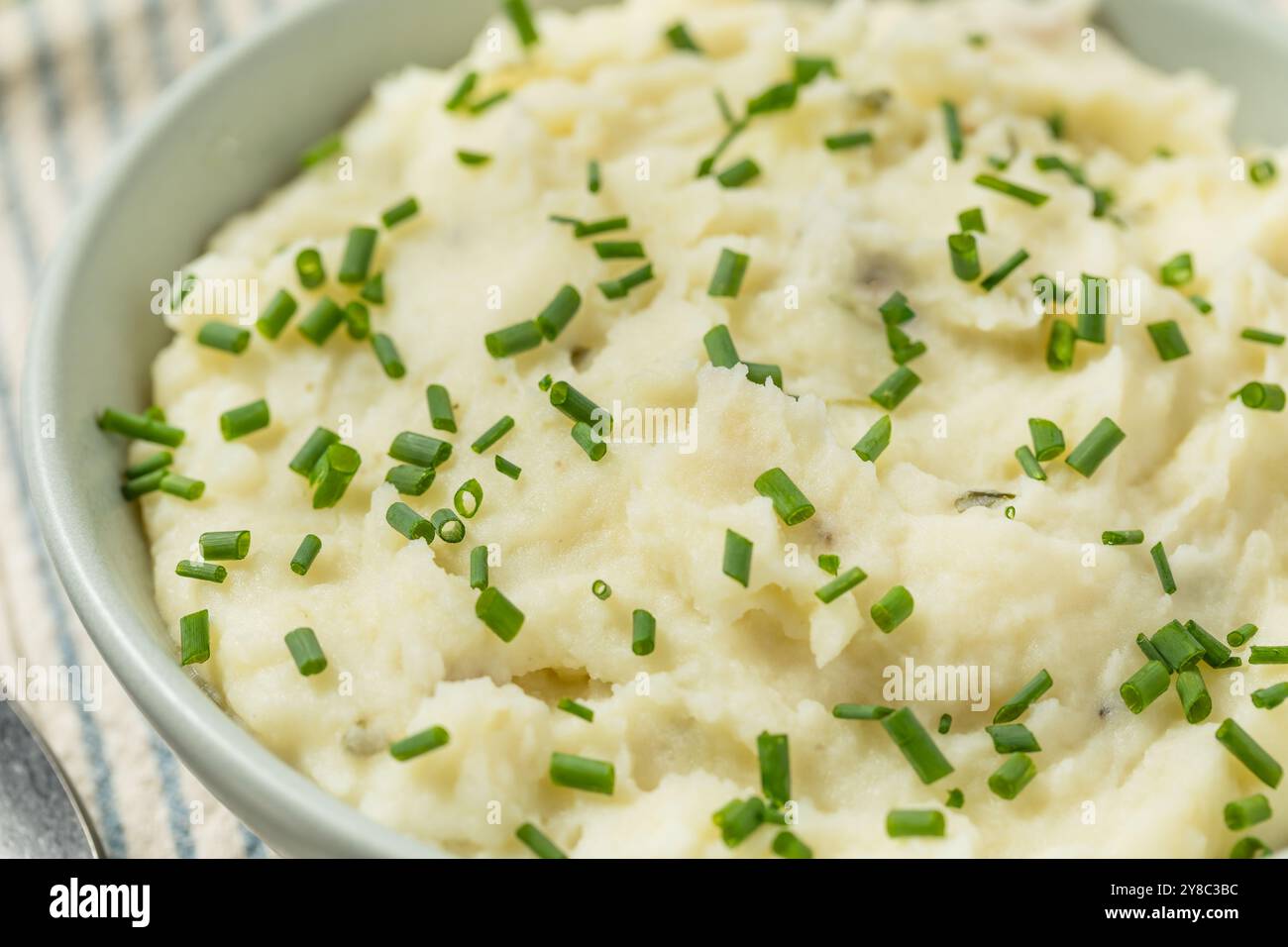 Homemade Chive and Garlic Mashed Potatoes with Butter Stock Photo - Alamy