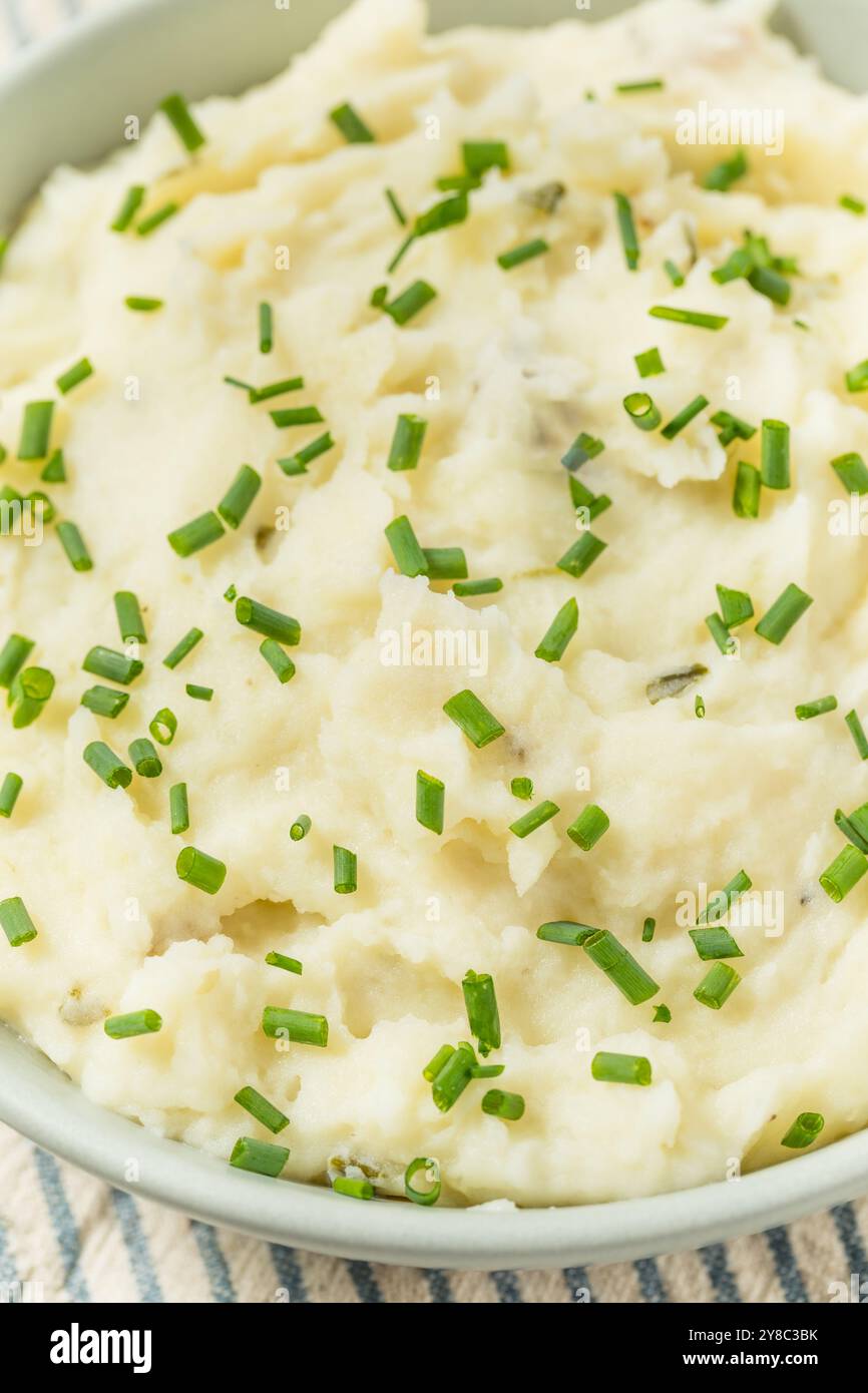 Homemade Chive and Garlic Mashed Potatoes with Butter Stock Photo - Alamy