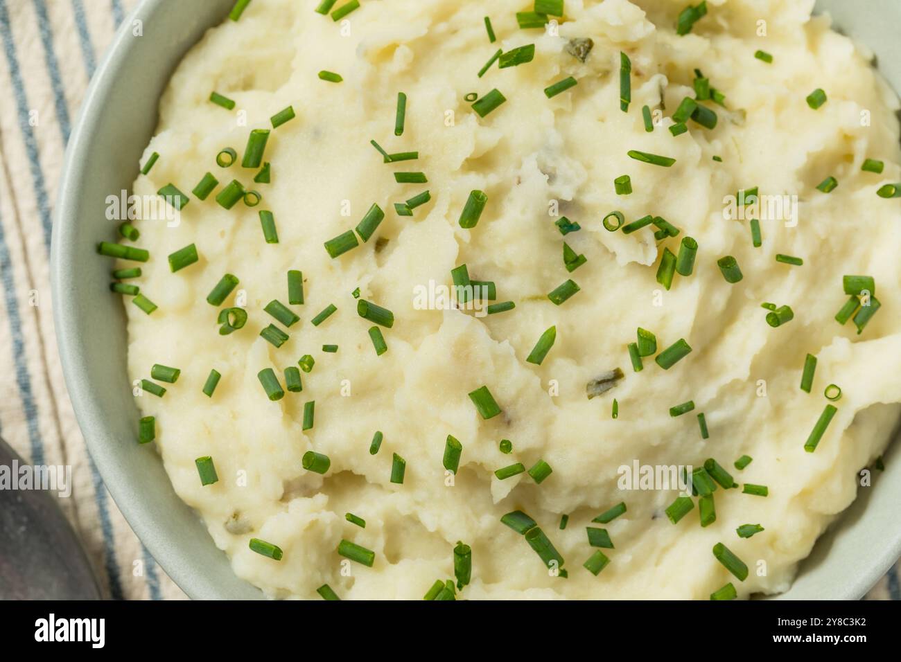 Homemade Chive and Garlic Mashed Potatoes with Butter Stock Photo - Alamy