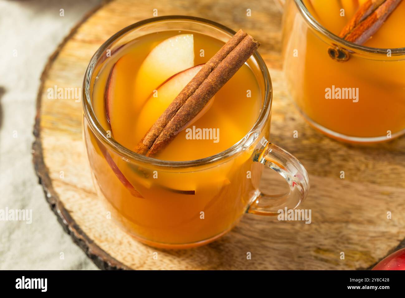 Cold Refreshing Autumn Apple Cider with a Cinnamon Stick Stock Photo ...