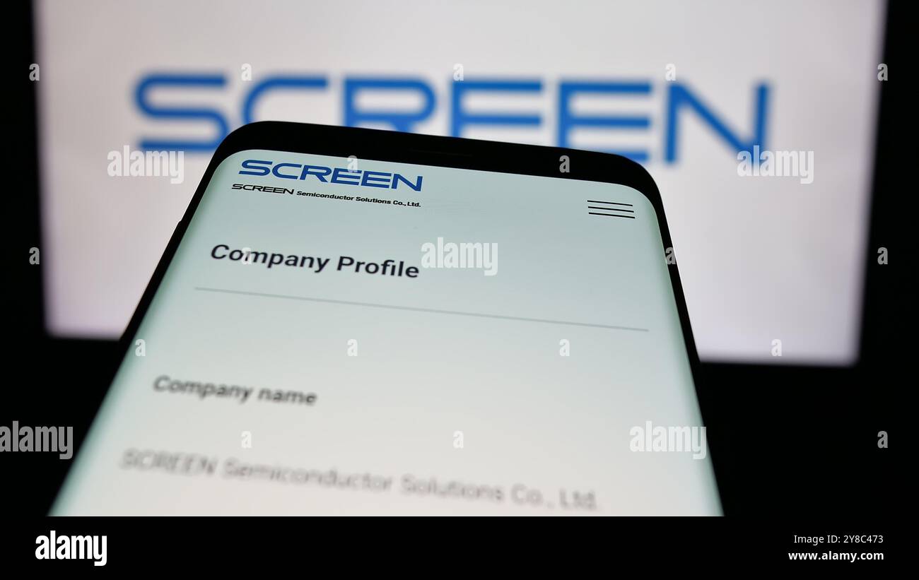 Mobile phone with website of Japanese company Dainippon Screen Mfg. Co ...