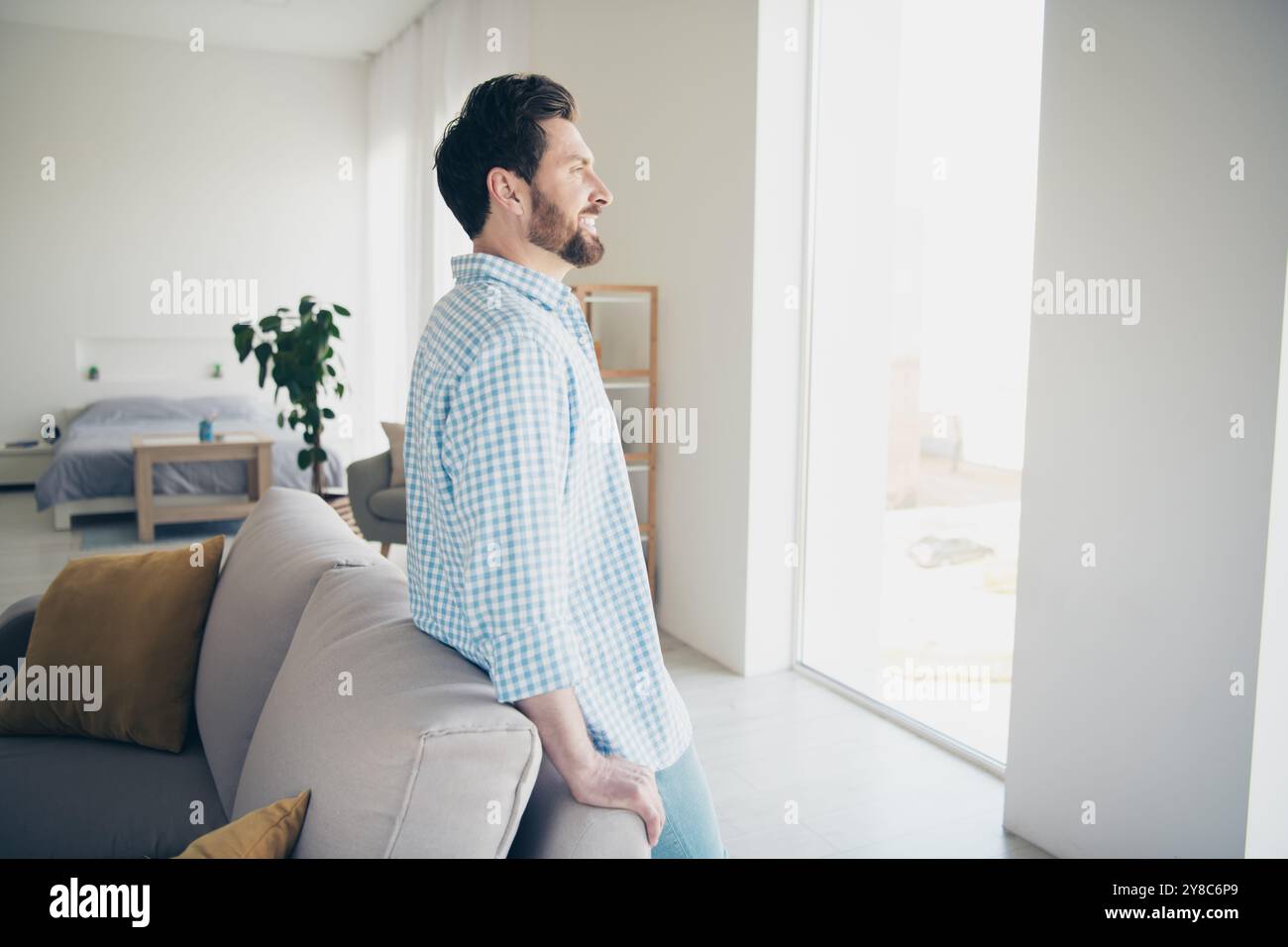 Photo of handsome bearded alone mature age adult man staying home in ...