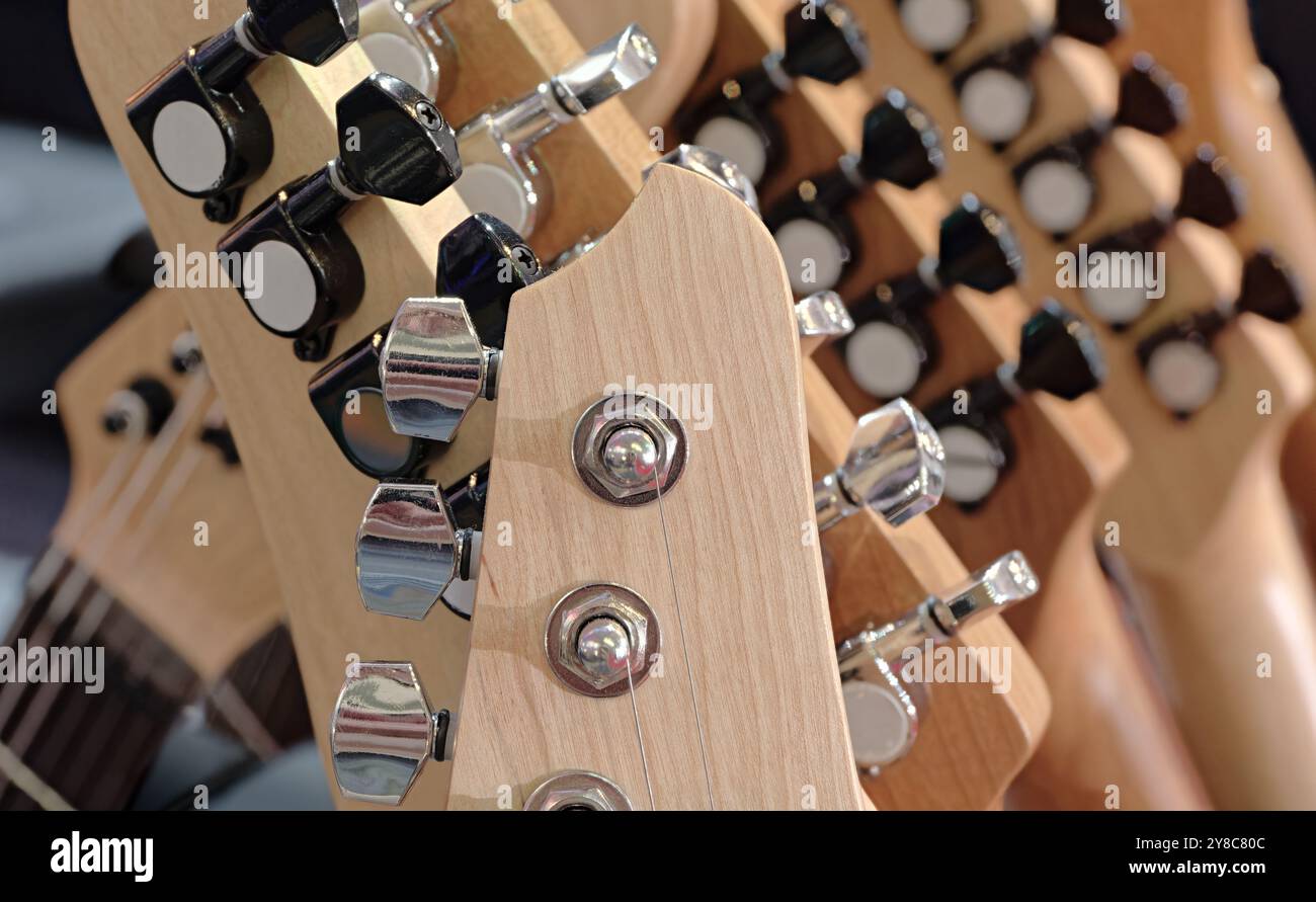 Group of guitars, traditional stringed musical instruments. Close up ...