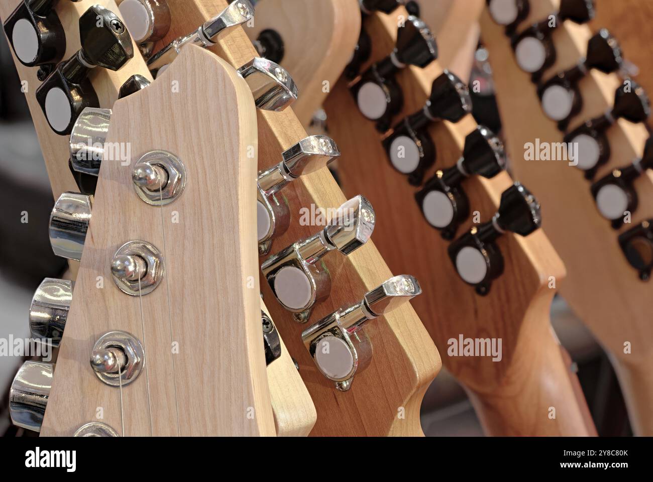 Group of guitars, traditional stringed musical instruments. Close up ...