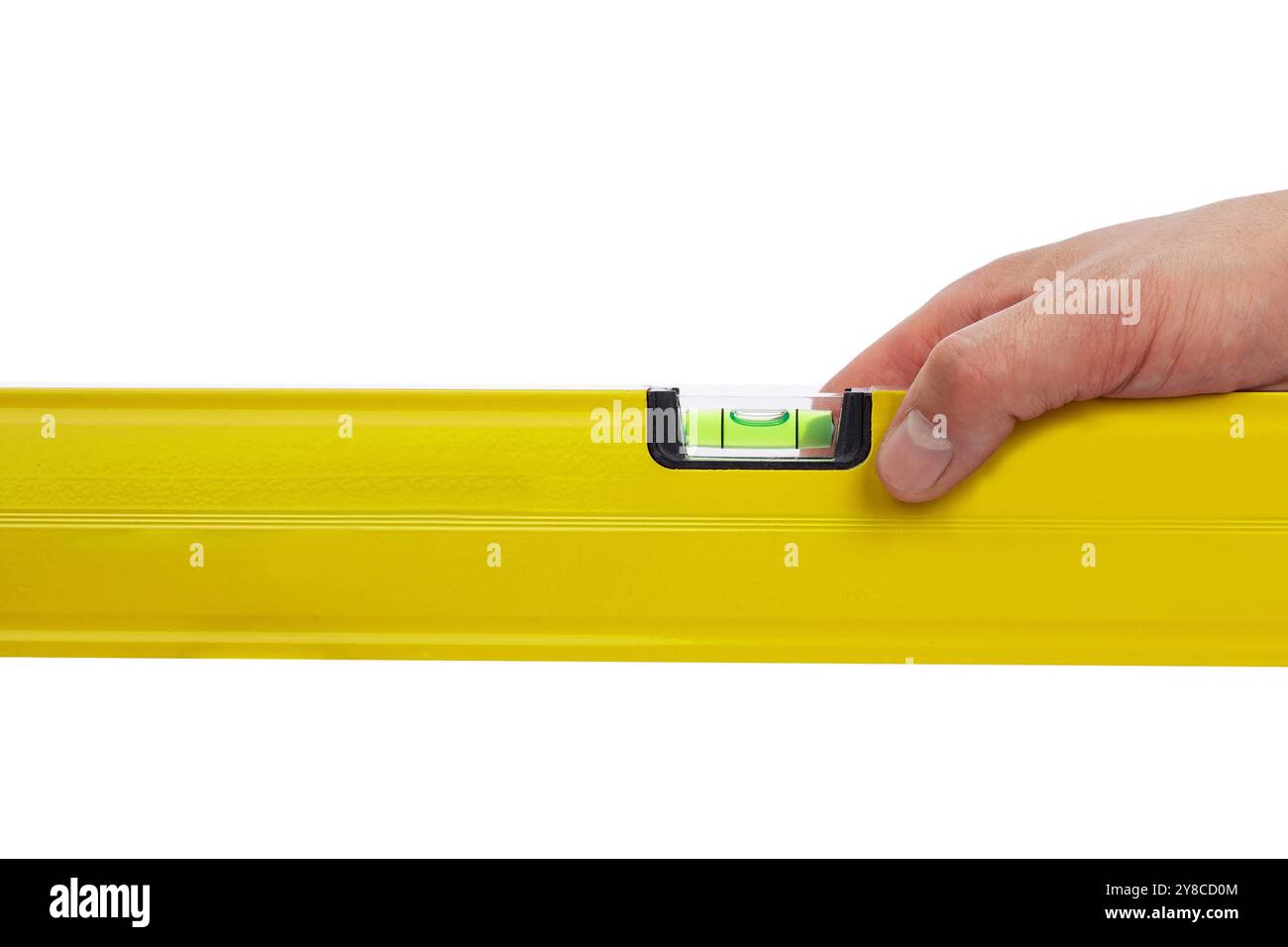 Hand holding yellow level tool isolated on white background Stock Photo ...