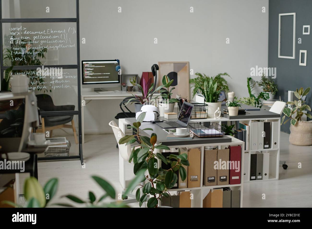 Fully equipped modern office with several workspaces and huge number of ...