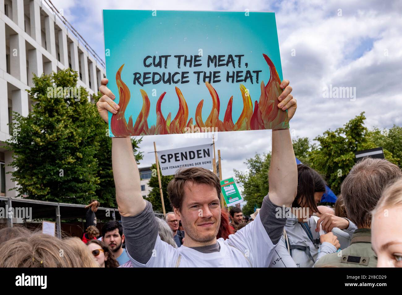 Berlin, Germany 31-5-2024 Activist with sign "cut meat reduce heat" at ...