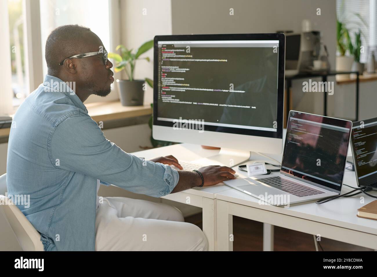 Workaholic sitting hi-res stock photography and images - Alamy