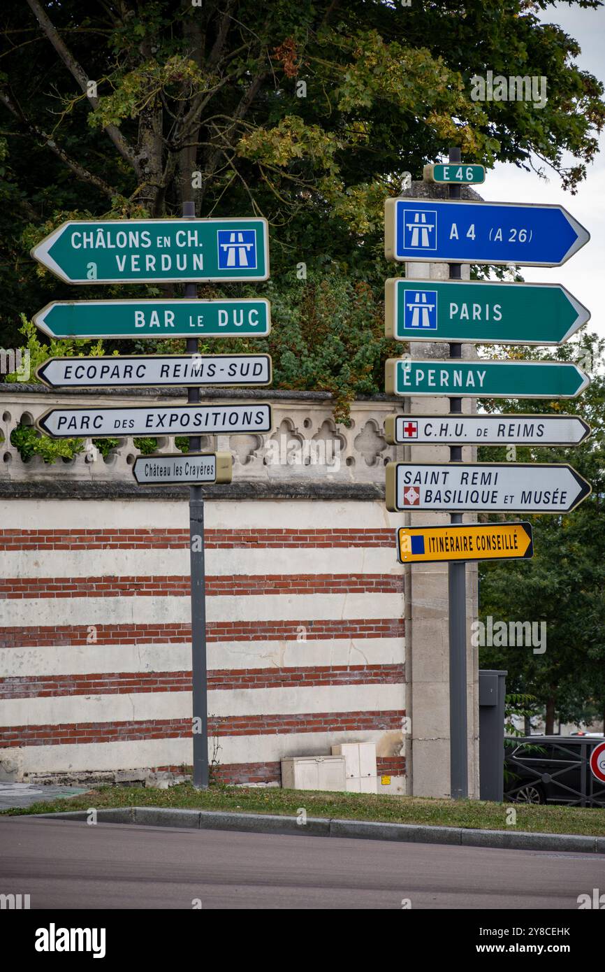 Roundabout with many direction to different cities, green and blue road ...