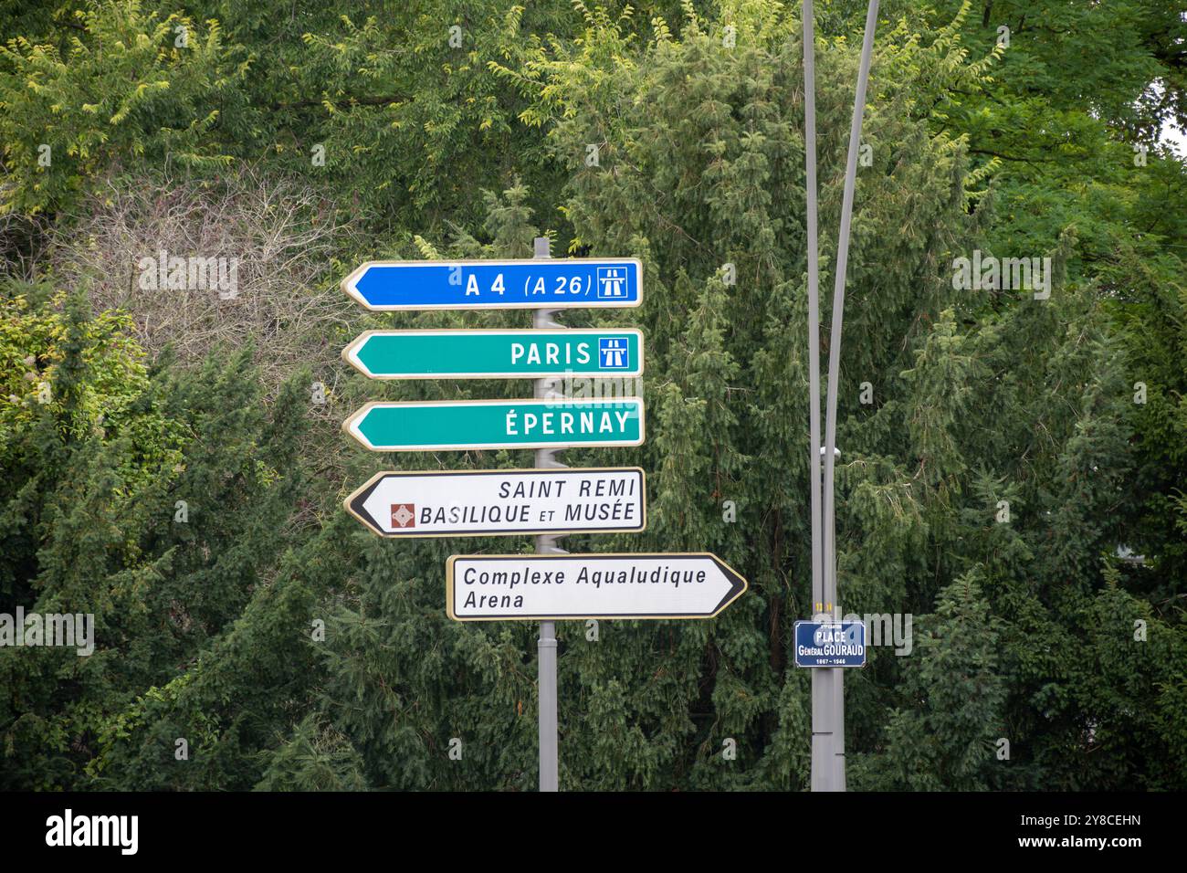 Roundabout with many direction to different cities, green and blue road ...