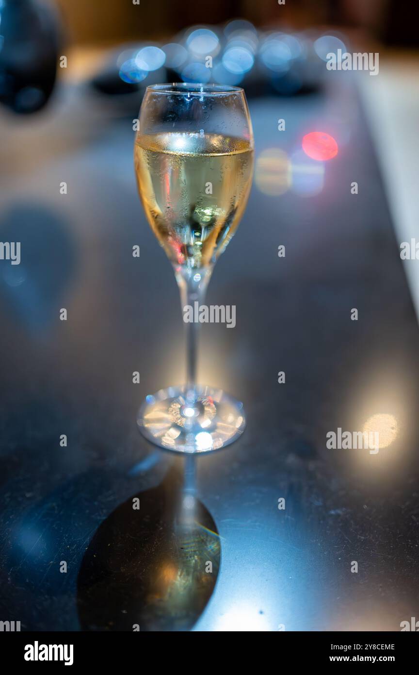 Tasting of brut and reserve grand cru champagne sparkling wine produced by traditional method in ...