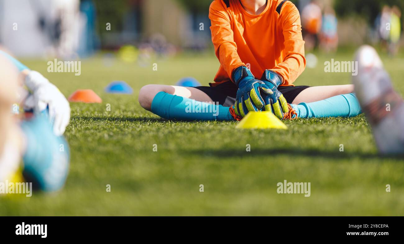 Kids in Football Goalkeepers Training. Young Boy Doing Soccer ...