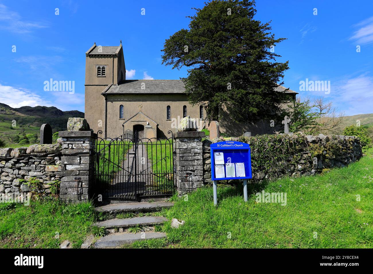 Summer view over St Cuthberts Church, Kentmere village, Lake District ...