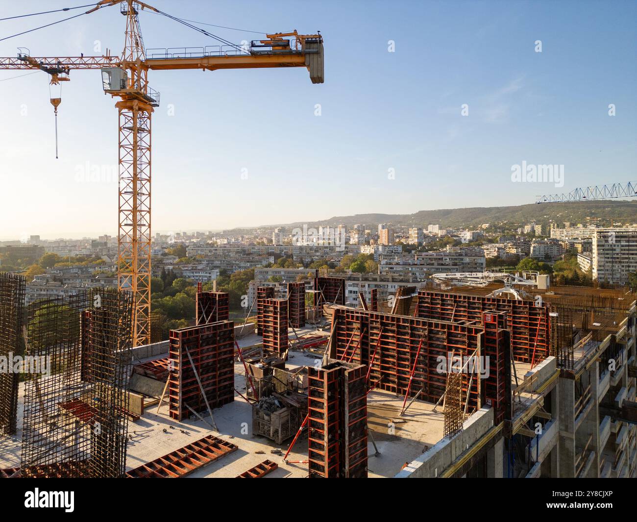 A drone video capturing the construction site of a high-rise building ...