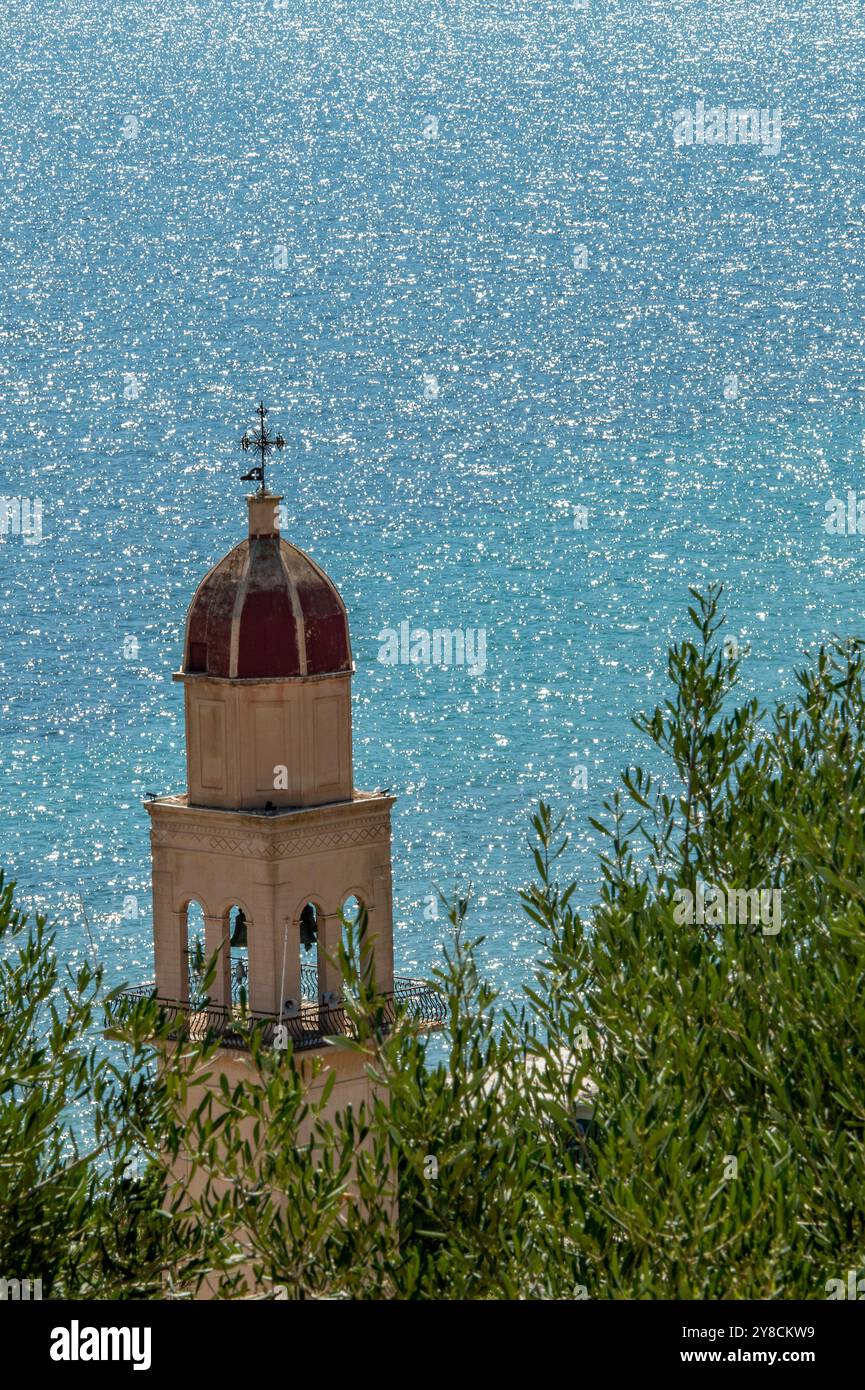 bell tower with eastern minaret or finial on a Greek orthodox church in ...