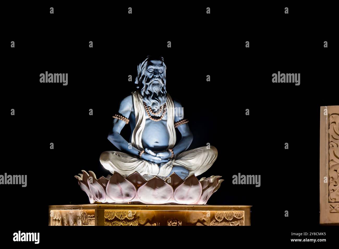 idols of hindu holy sage sitting in mediation at outdoor at night Stock ...