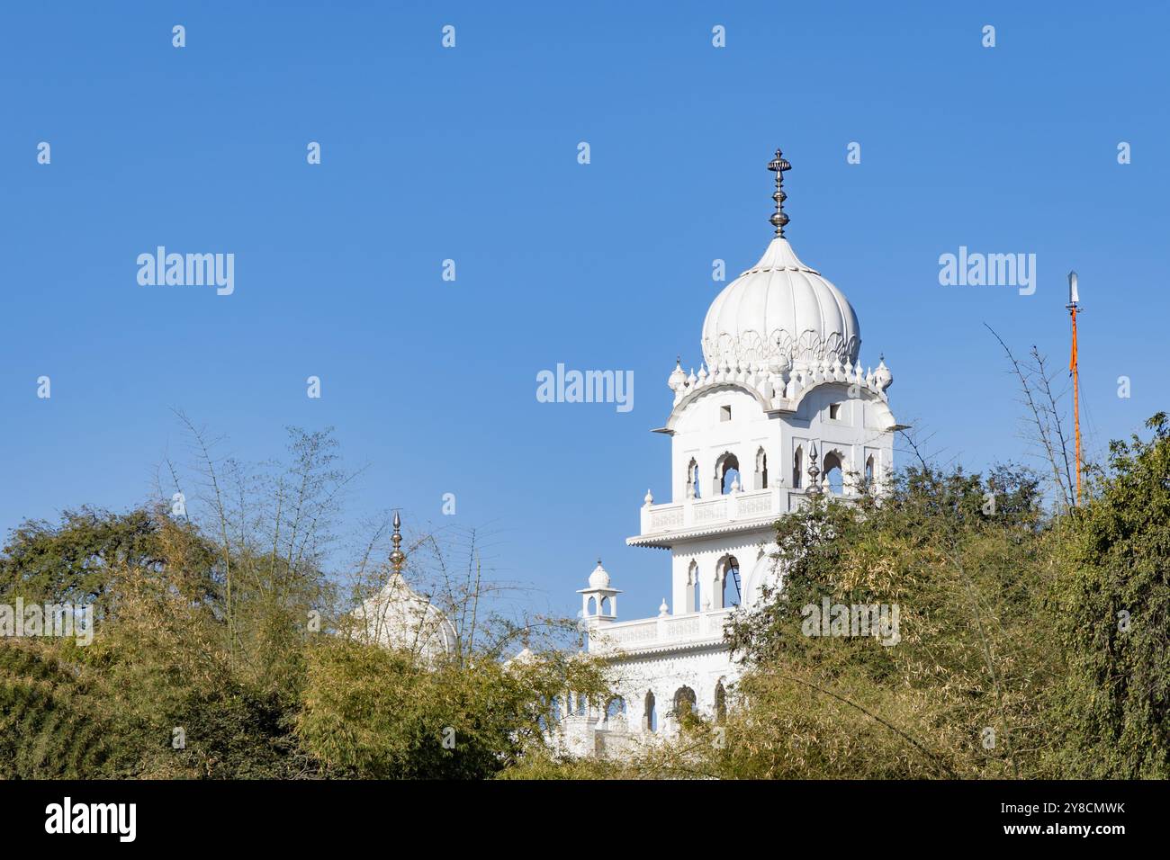 isolated white temple dome architecture with bright blue sky at morning ...