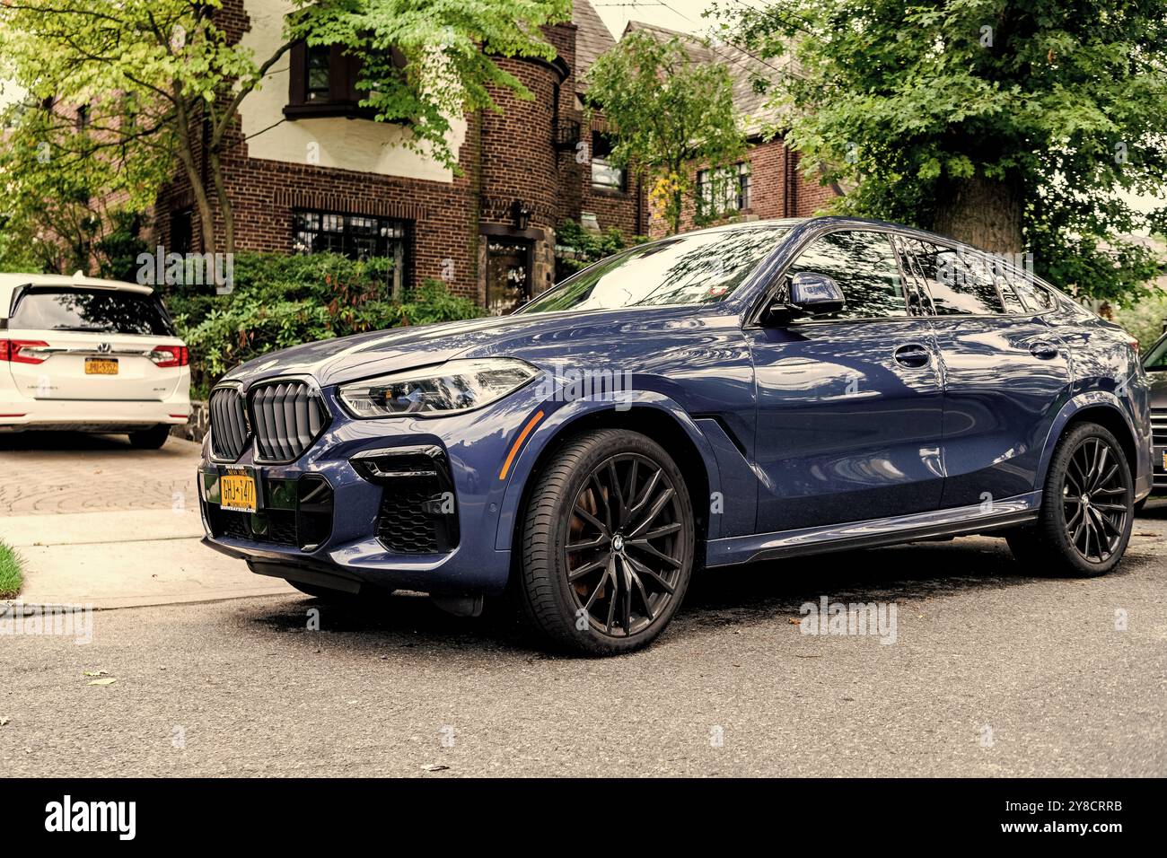 New York City, USA - August 26, 2023: BMW X6 SUV car crossover blue color, corner side view ...