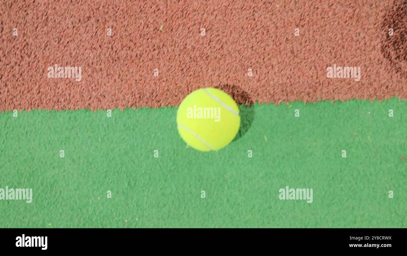 Single Tennis Ball On Tennis Court. Tennis Sport in tennis hall, green ...