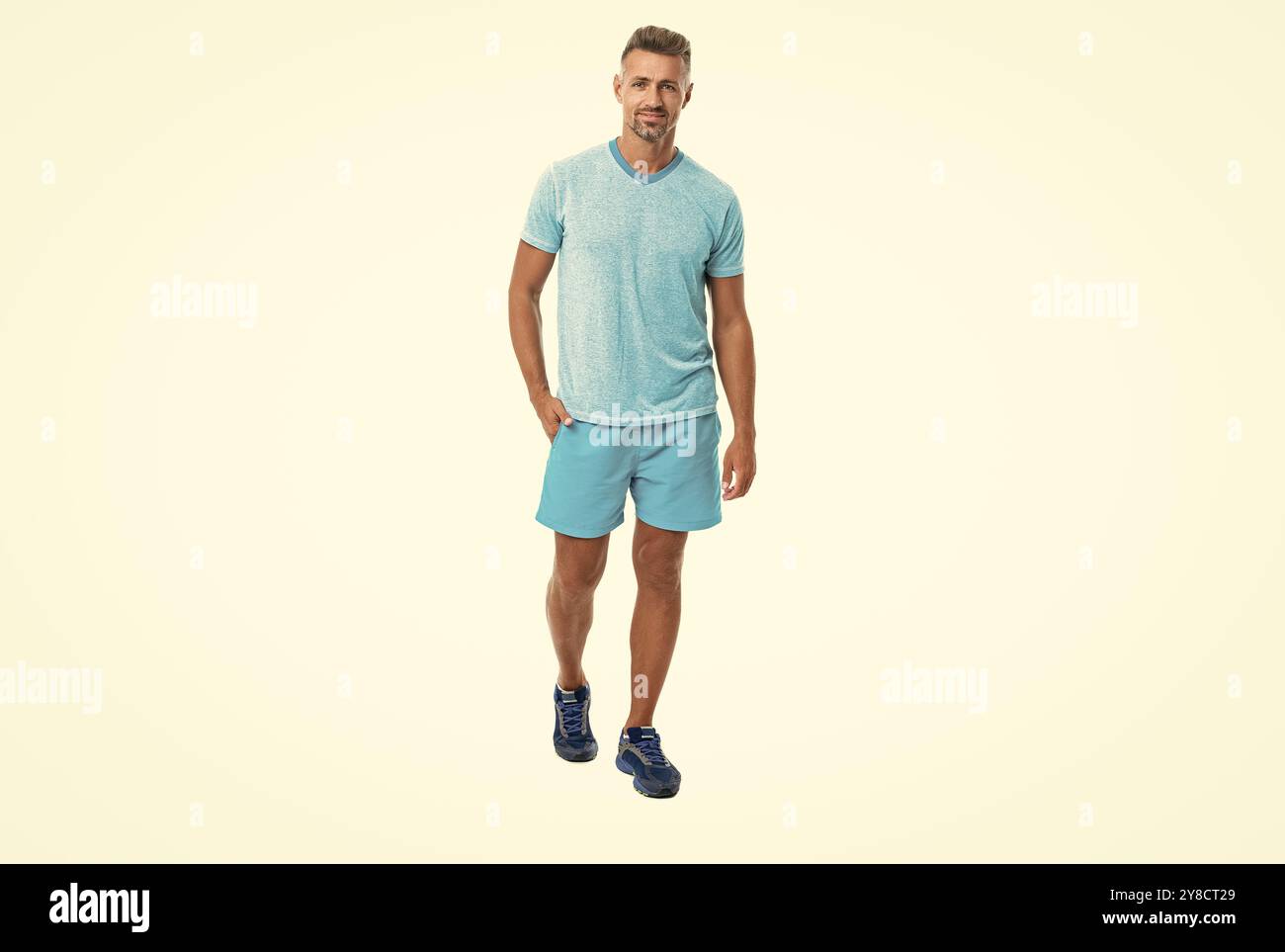 positive runner sport man isolated on white background. Athletic mature ...