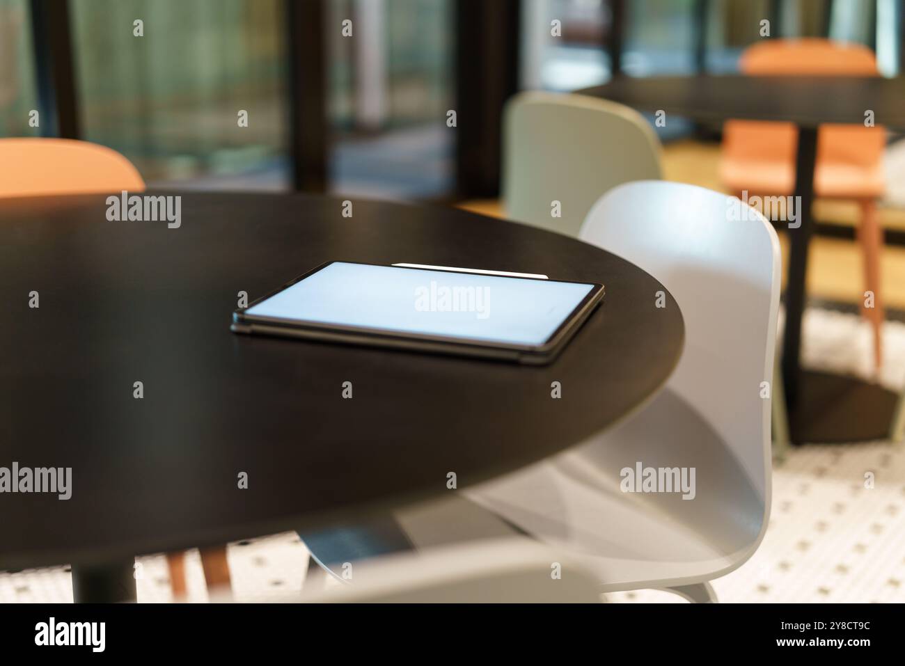 Restaurant office space table. Graphic tablbet ebook reader empty ...